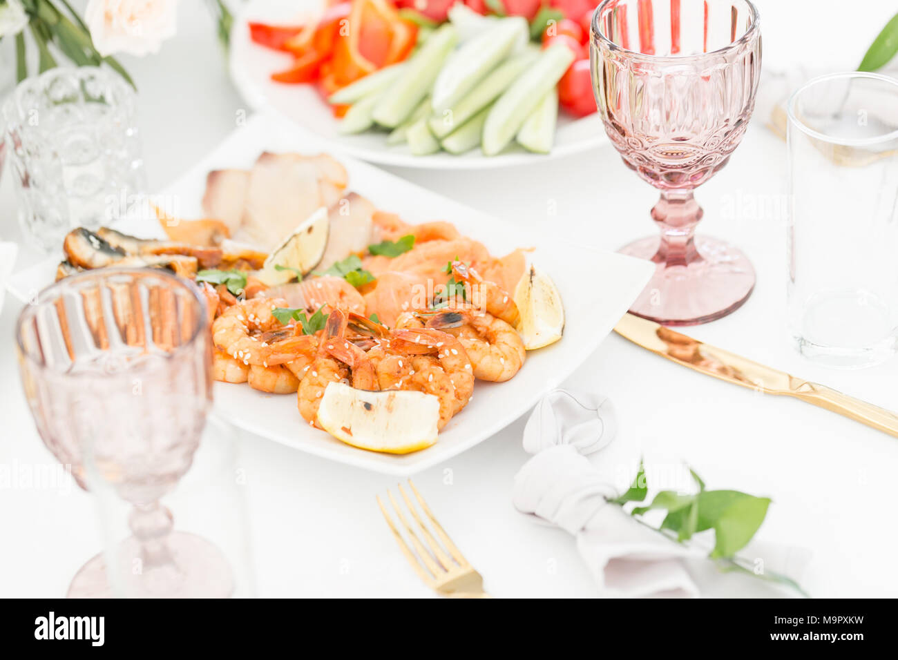 Fish platter. Plate with seafood on the table, snacks at the banquet ...