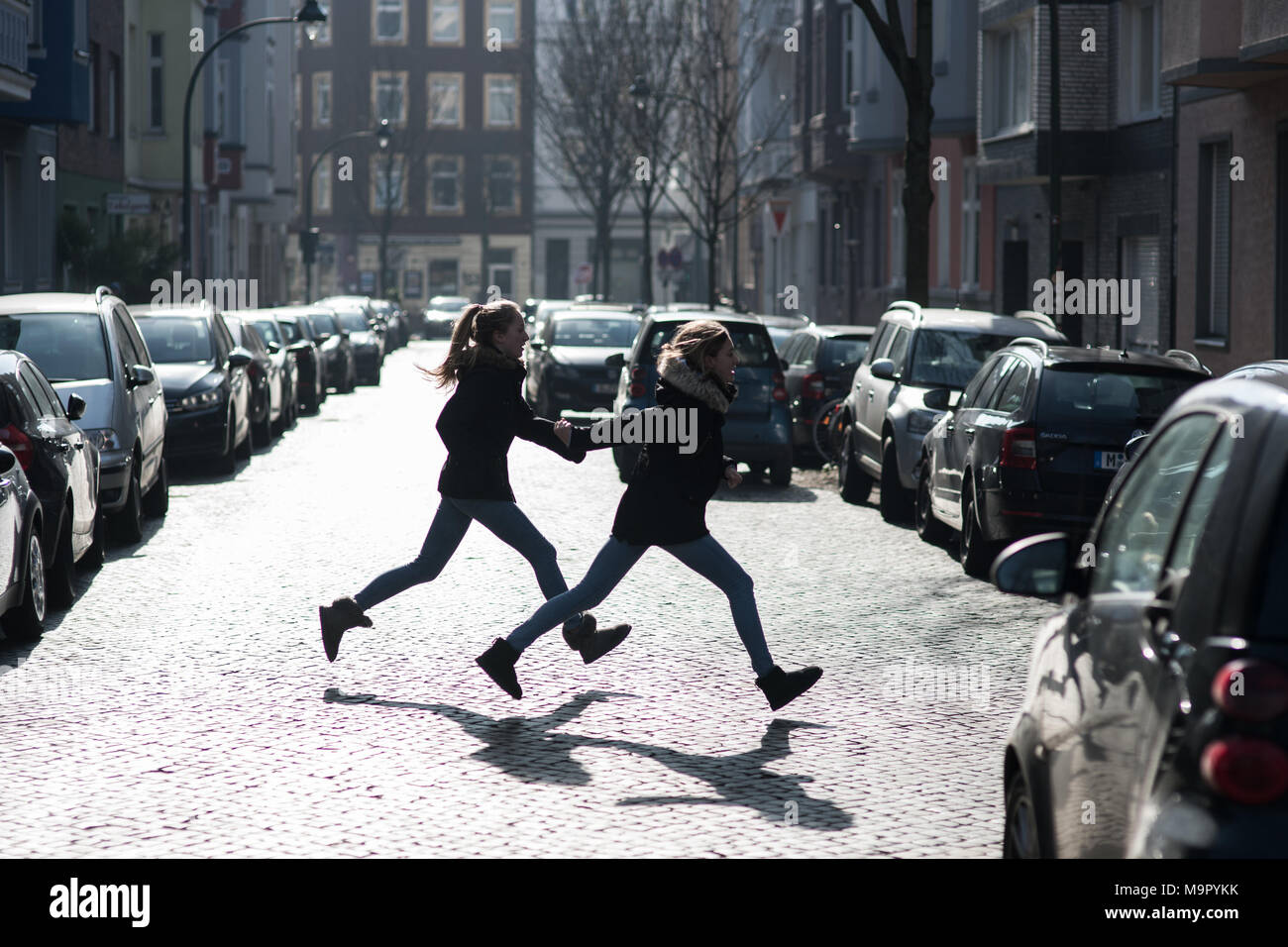Running across road hi-res stock photography and images - Alamy
