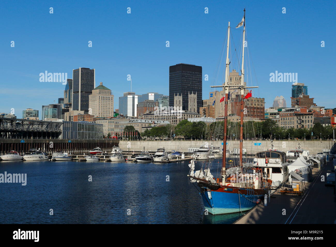 Blue sailboat in harbour, Old Port, Montreal, Quebec Province, Canada ...