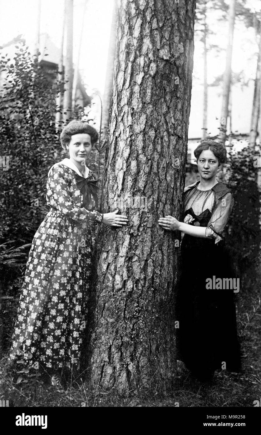 Women hugging a tree, 1930s, Germany Stock Photo - Alamy