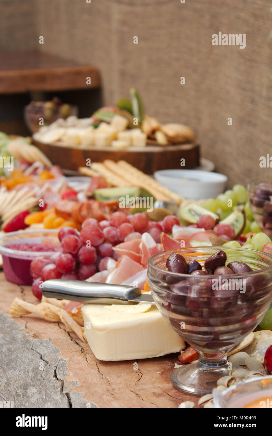 A bright & colorful selection of fruit, nuts, cheeses, dips, Deli meats ...