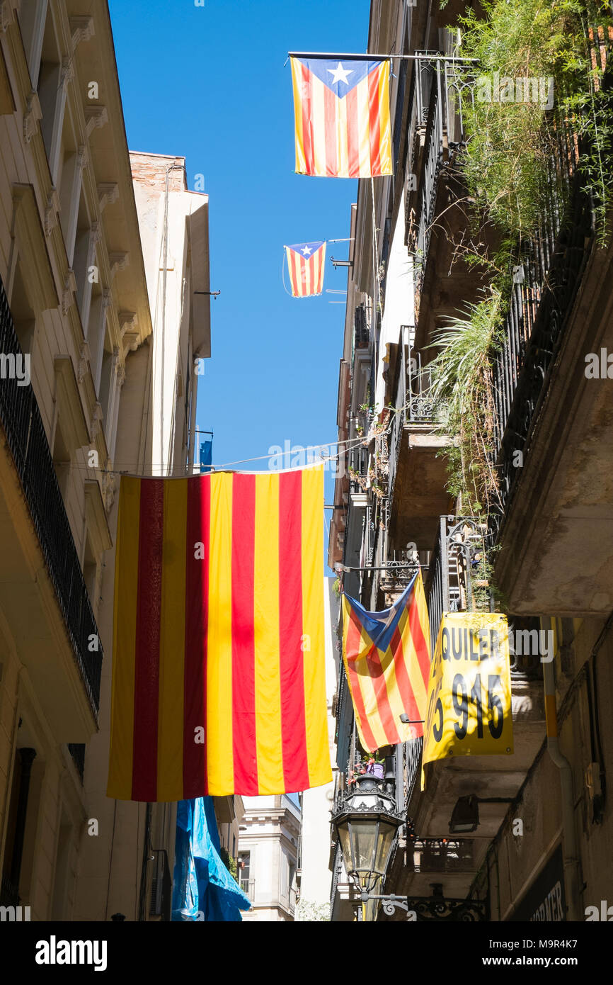 Catalonian flags hang from buildings in Barcelona, Spain Stock Photo ...