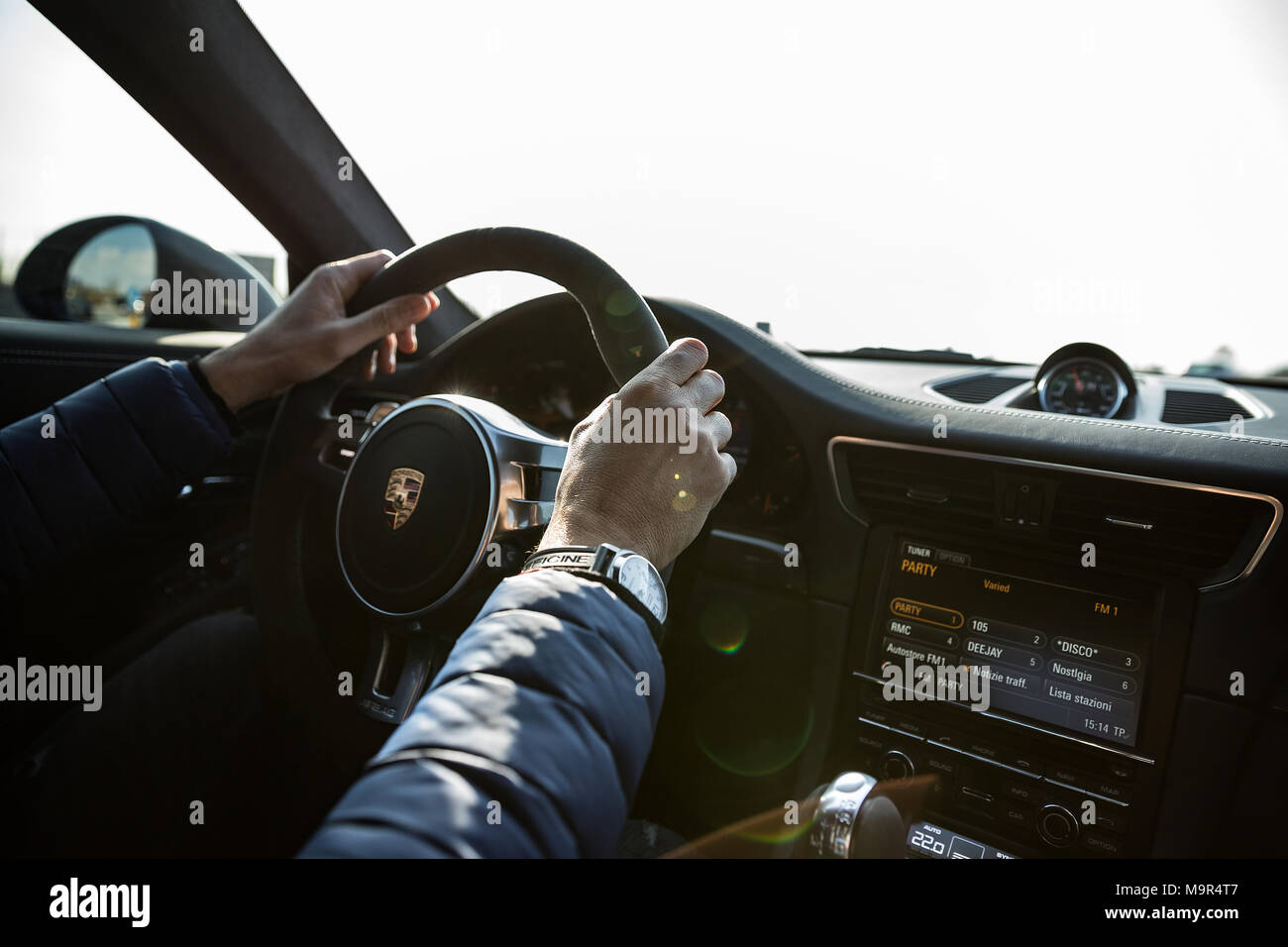 Man driving porsche hi-res stock photography and images - Alamy