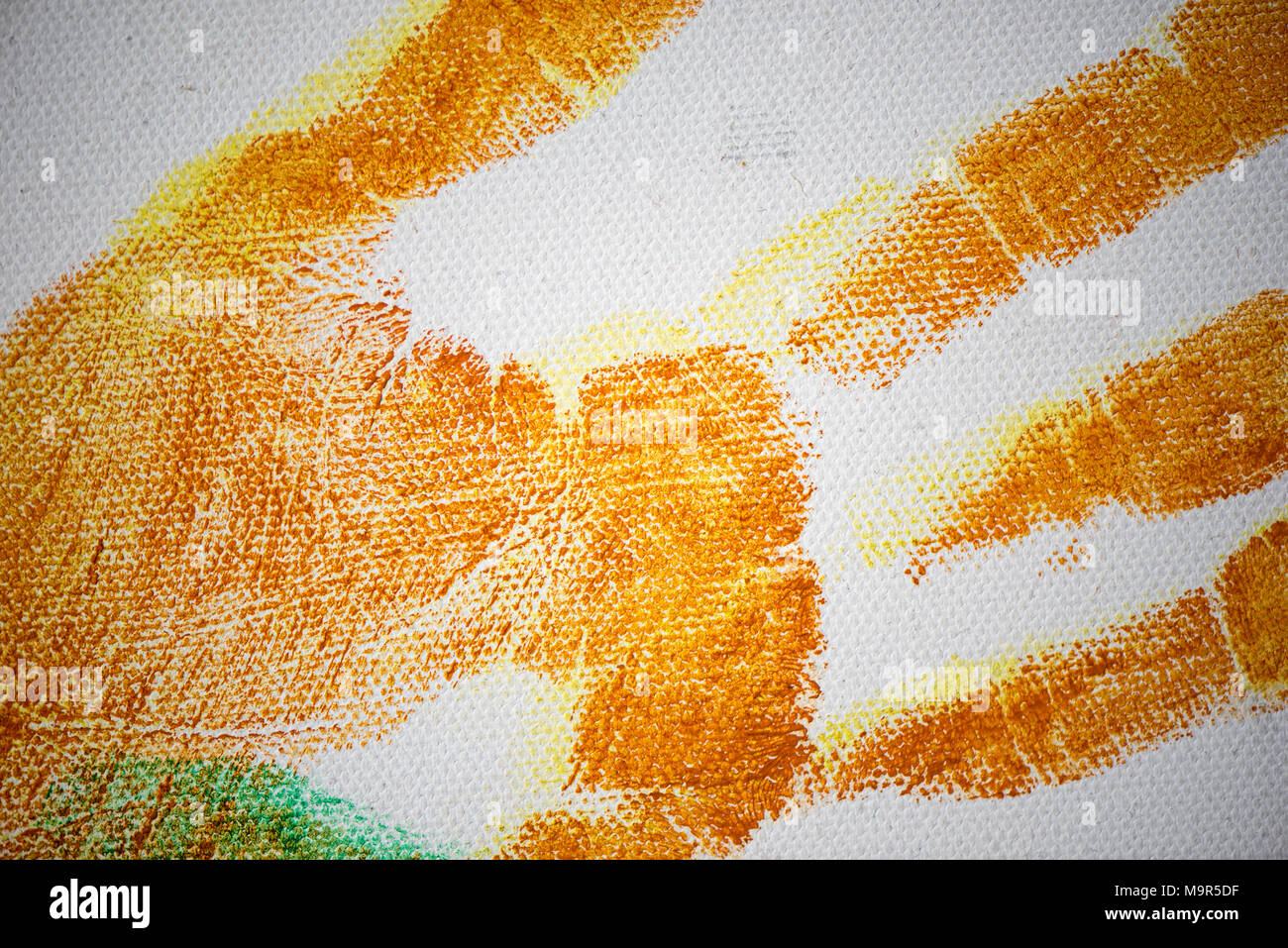 Colourful Handprints of various sizes on canvas Stock Photo - Alamy