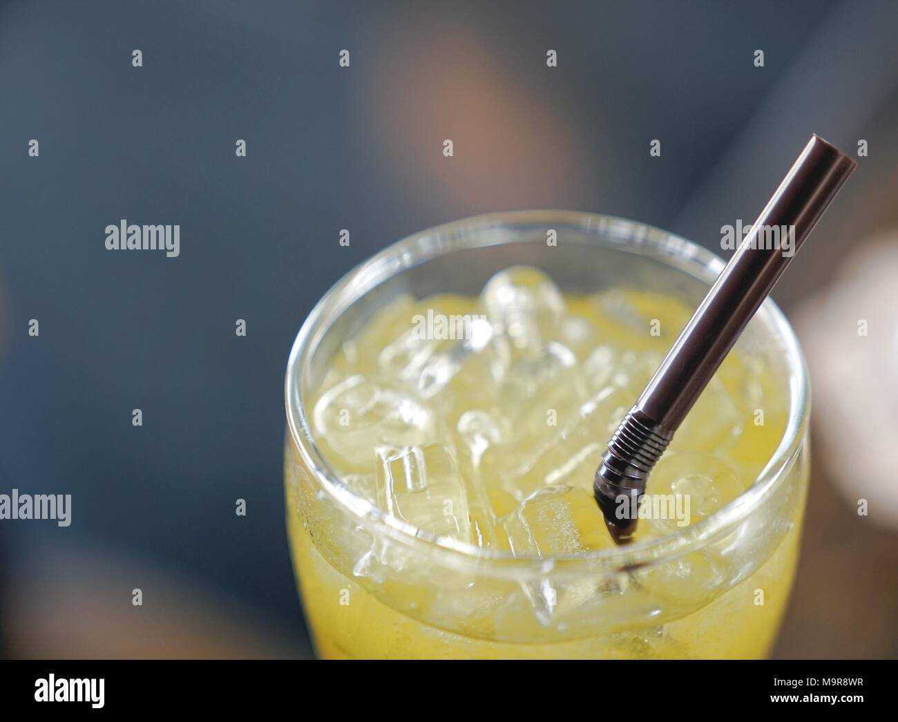 Iced herbal tea in glass with straw Stock Photo - Alamy
