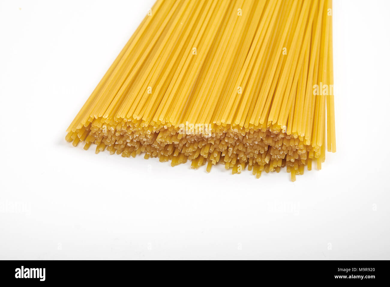 Uncooked pasta spaghetti macaroni isolated on white background Stock ...