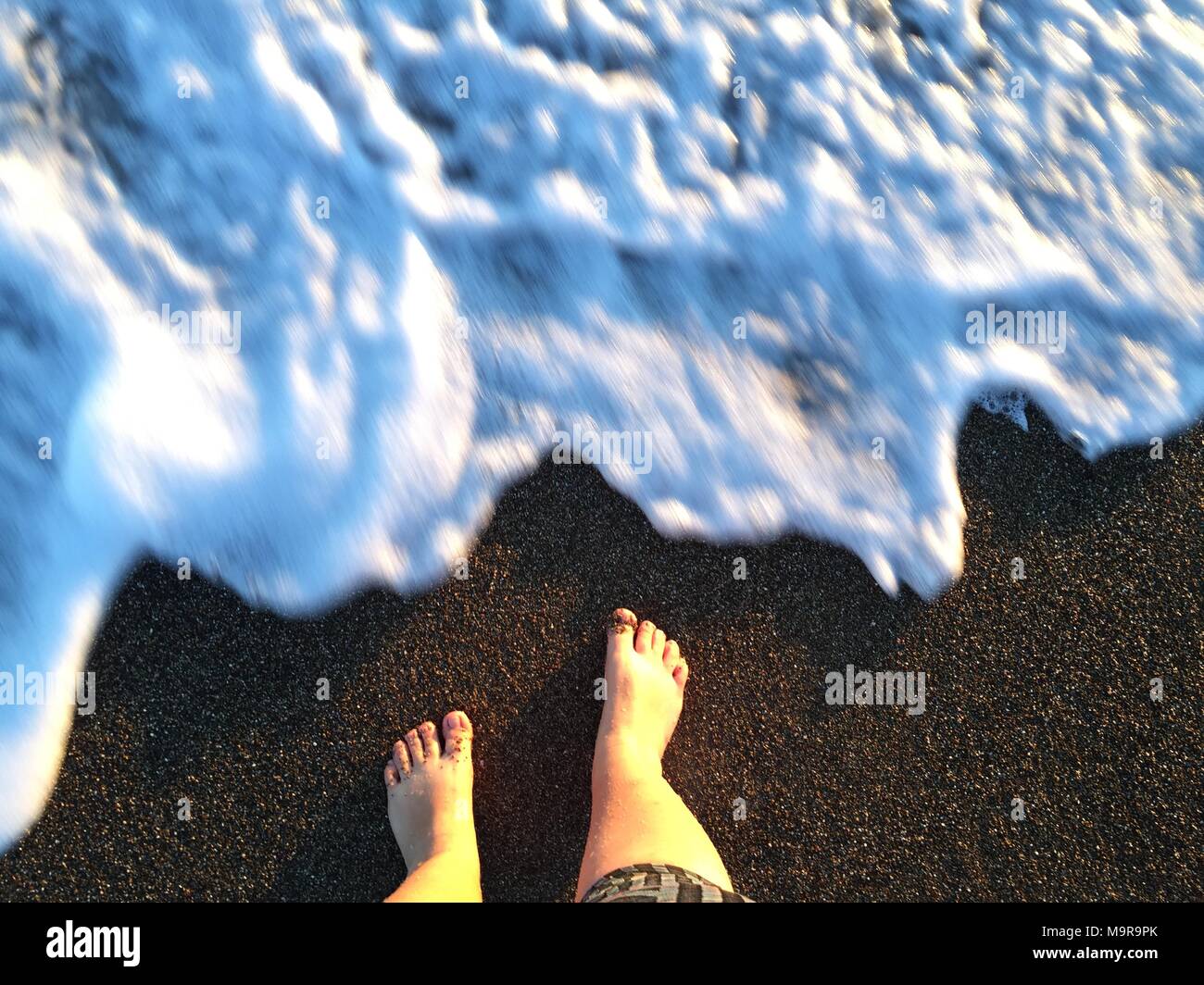 Footprints in the sand at sunset. Beautiful sandy tropical beach with ...