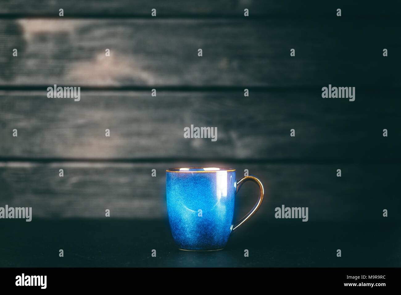 Blue coffee mug Stock Photo - Alamy
