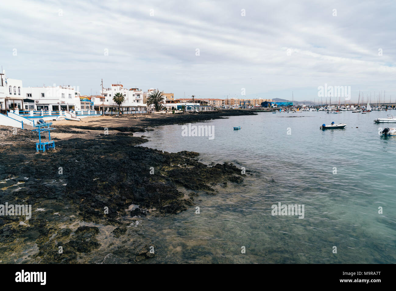 Waterfront and harbour of Corralejo Bay in Fuerteventura Stock Photo ...