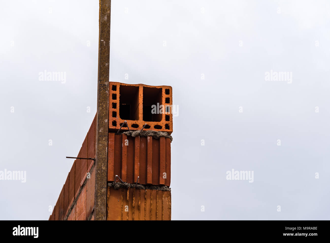 Detail of reinforced concrete blocks wall under construction Stock ...