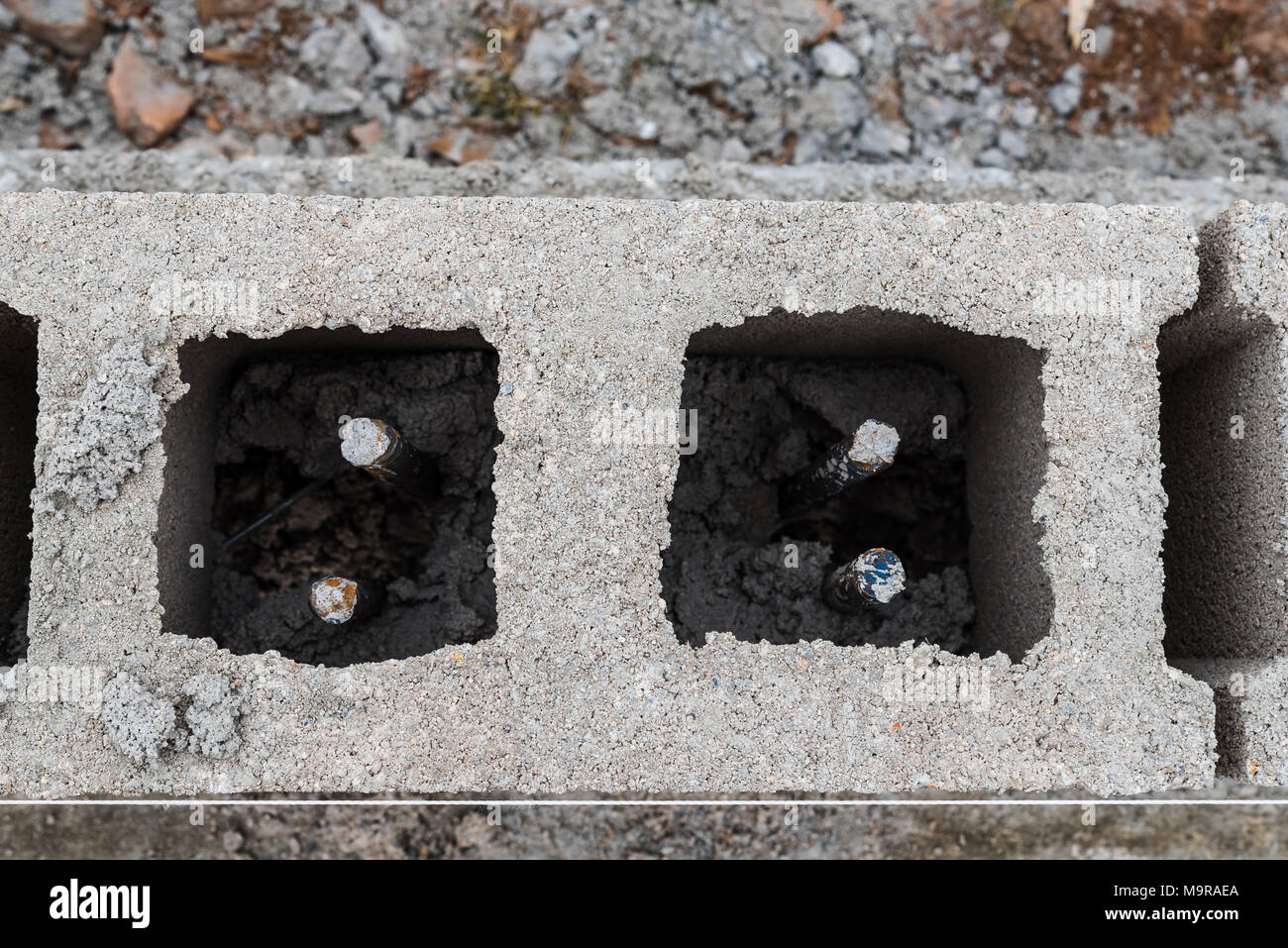 Detail of reinforced concrete blocks wall under construction Stock ...
