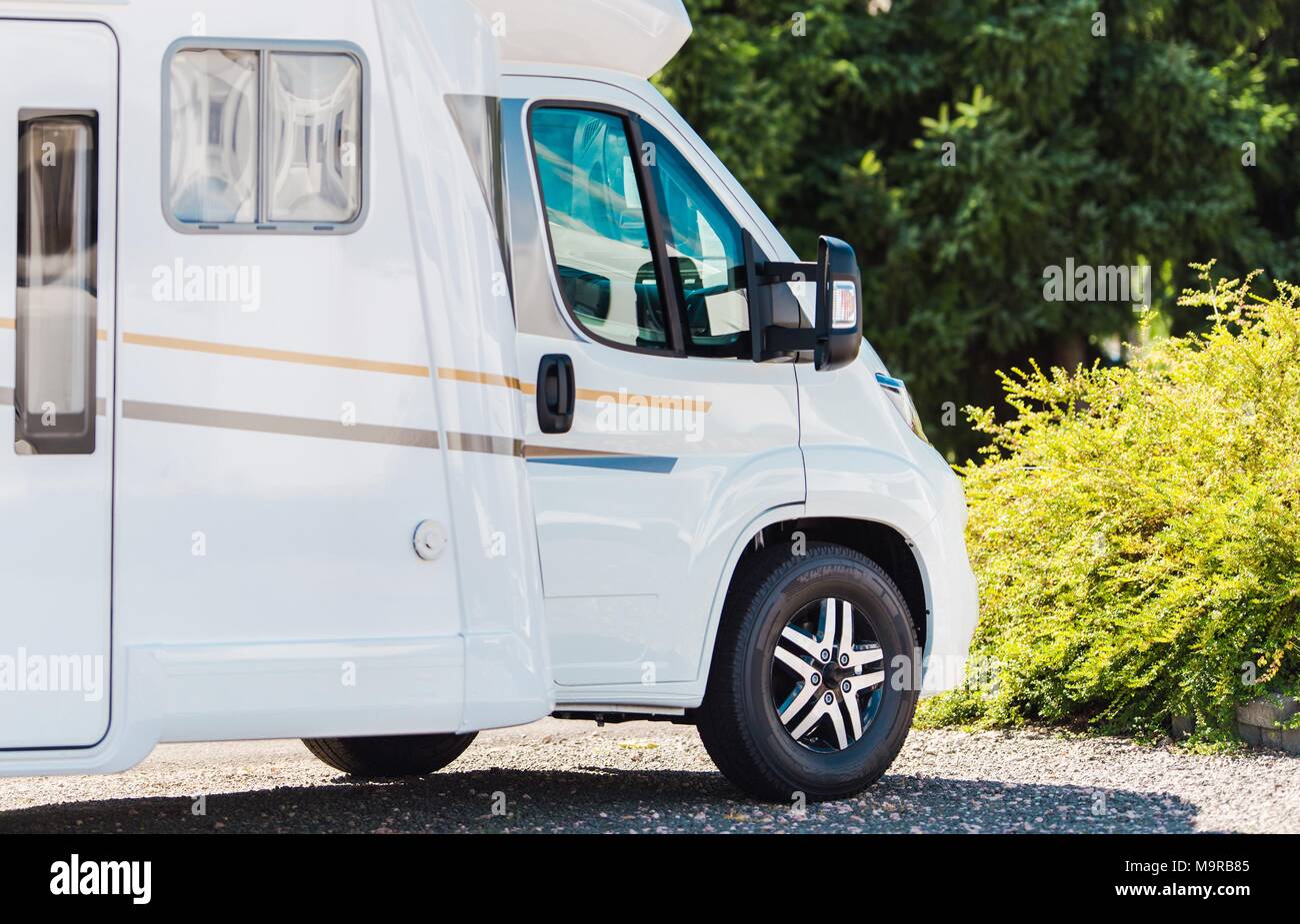 Modern White Compact Camper Van on the RV Camping Spot Stock Photo - Alamy