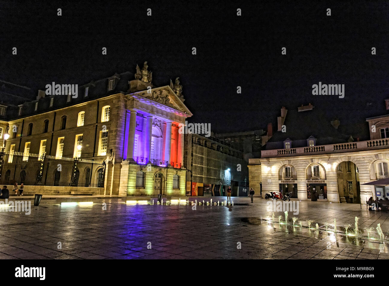 Night-time in the Place Liberacion, Dijon, Burgundy with fountains and ...