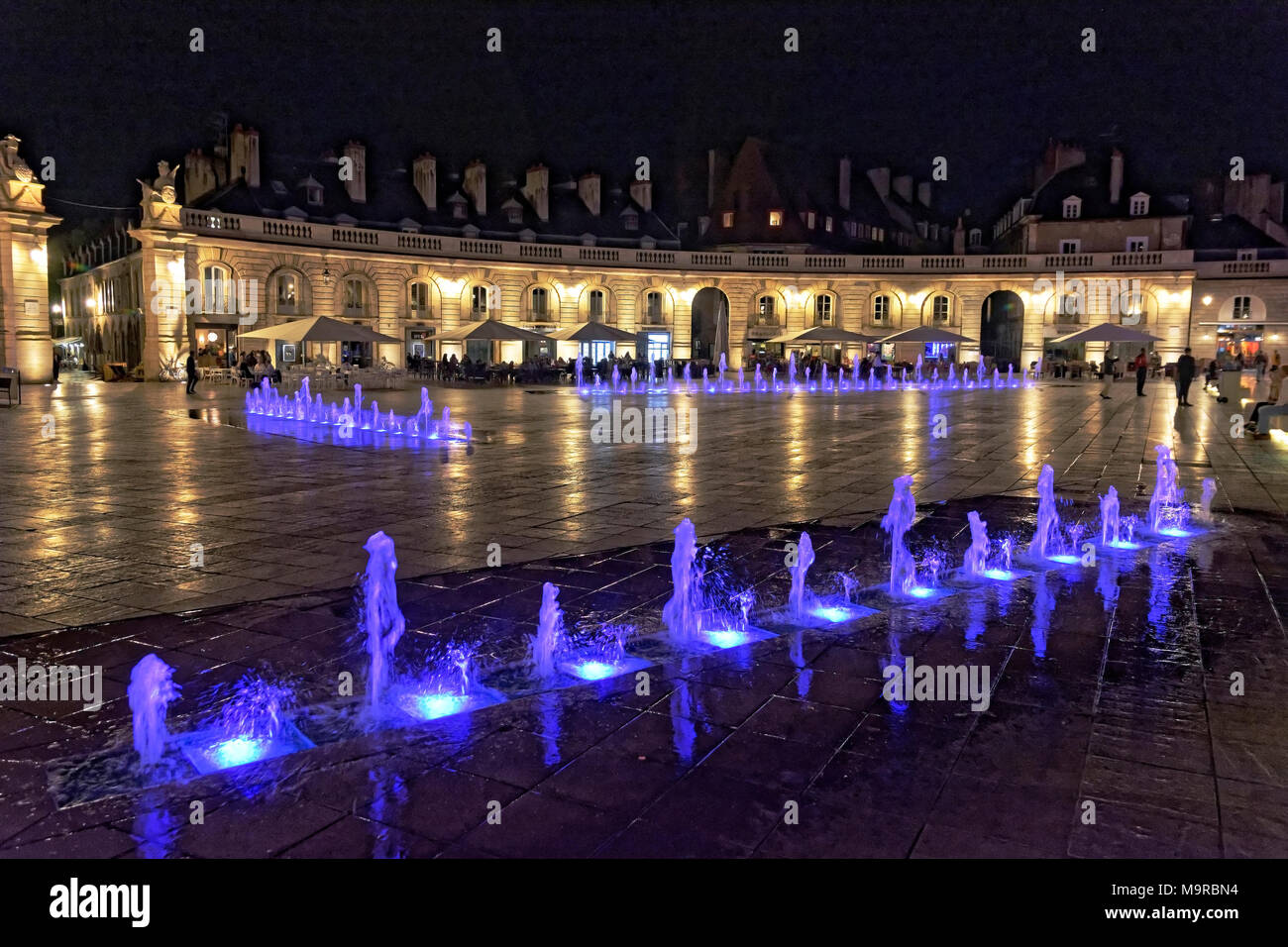 Night-time in the Place Liberacion, Dijon, Burgundy with fountains and ...