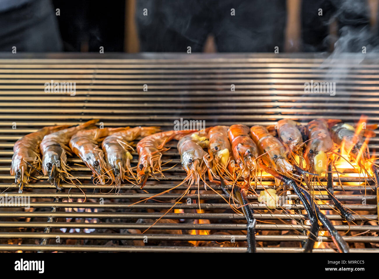 Chef cooking of Grilled Prawn Stock Photo - Alamy