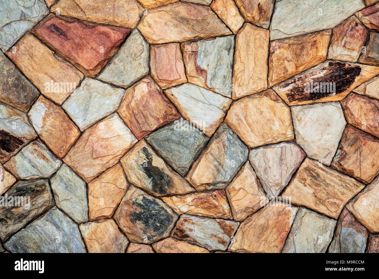 Decorative flagstone wall can be used as backgrounds Stock Photo - Alamy