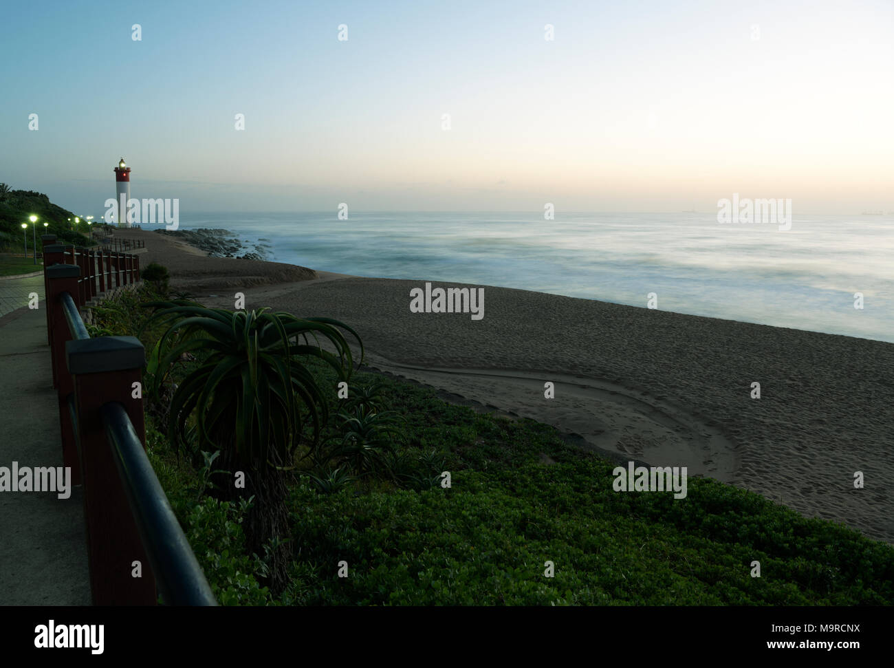 Durban, KwaZulu-Natal, South Africa, daybreak, sunrise over promenade ...