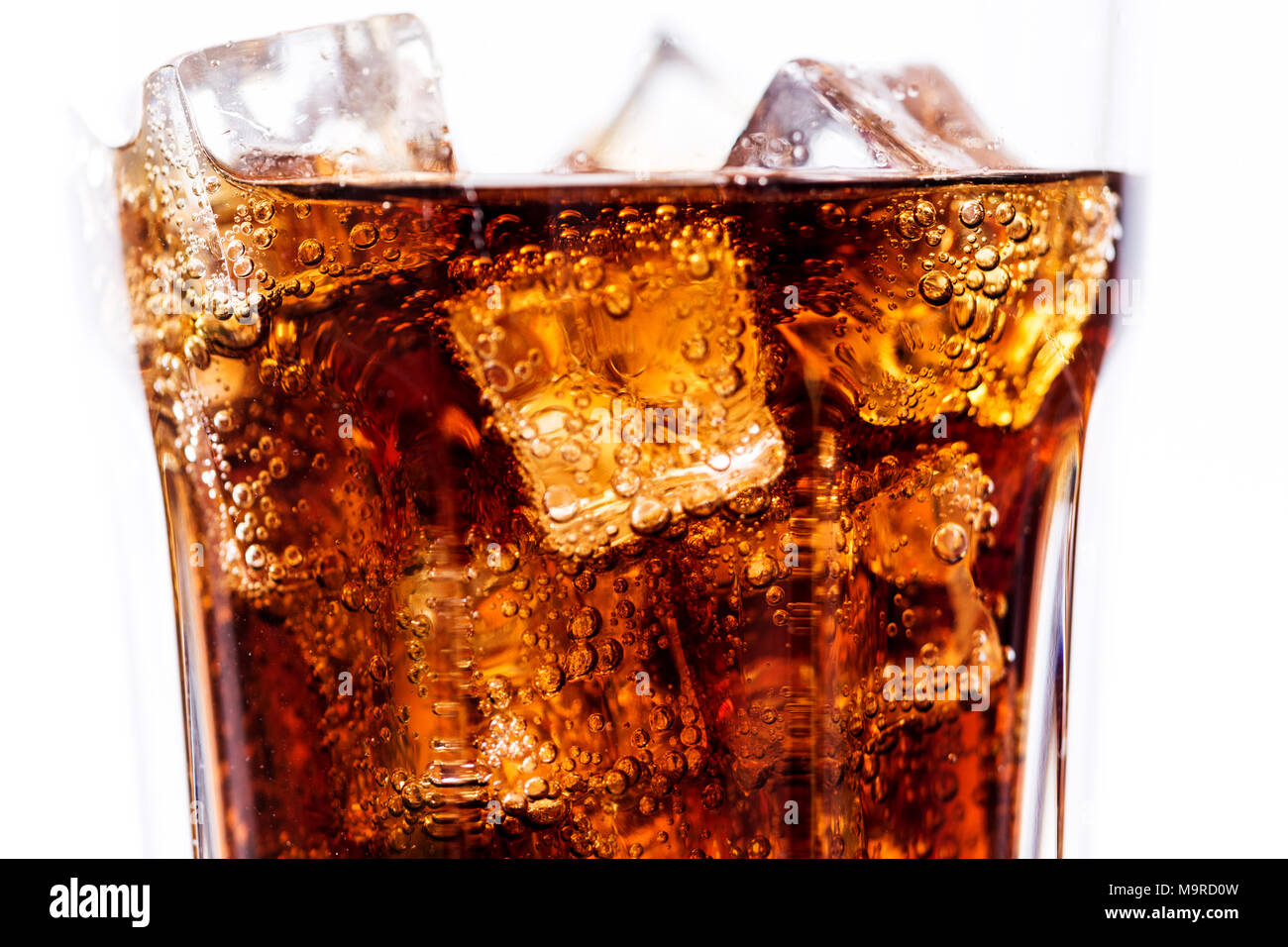 Cold cola drink with bubbles and ice cubes Stock Photo - Alamy