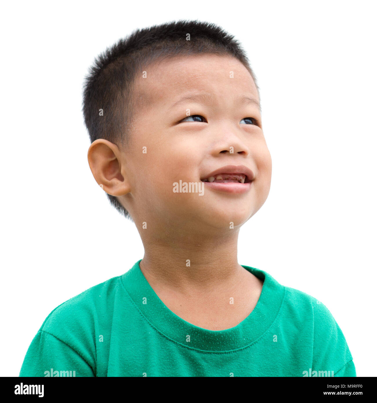 Headshot of happy Asian child smiling and looking up with hope. Portrait of young boy isolated ...