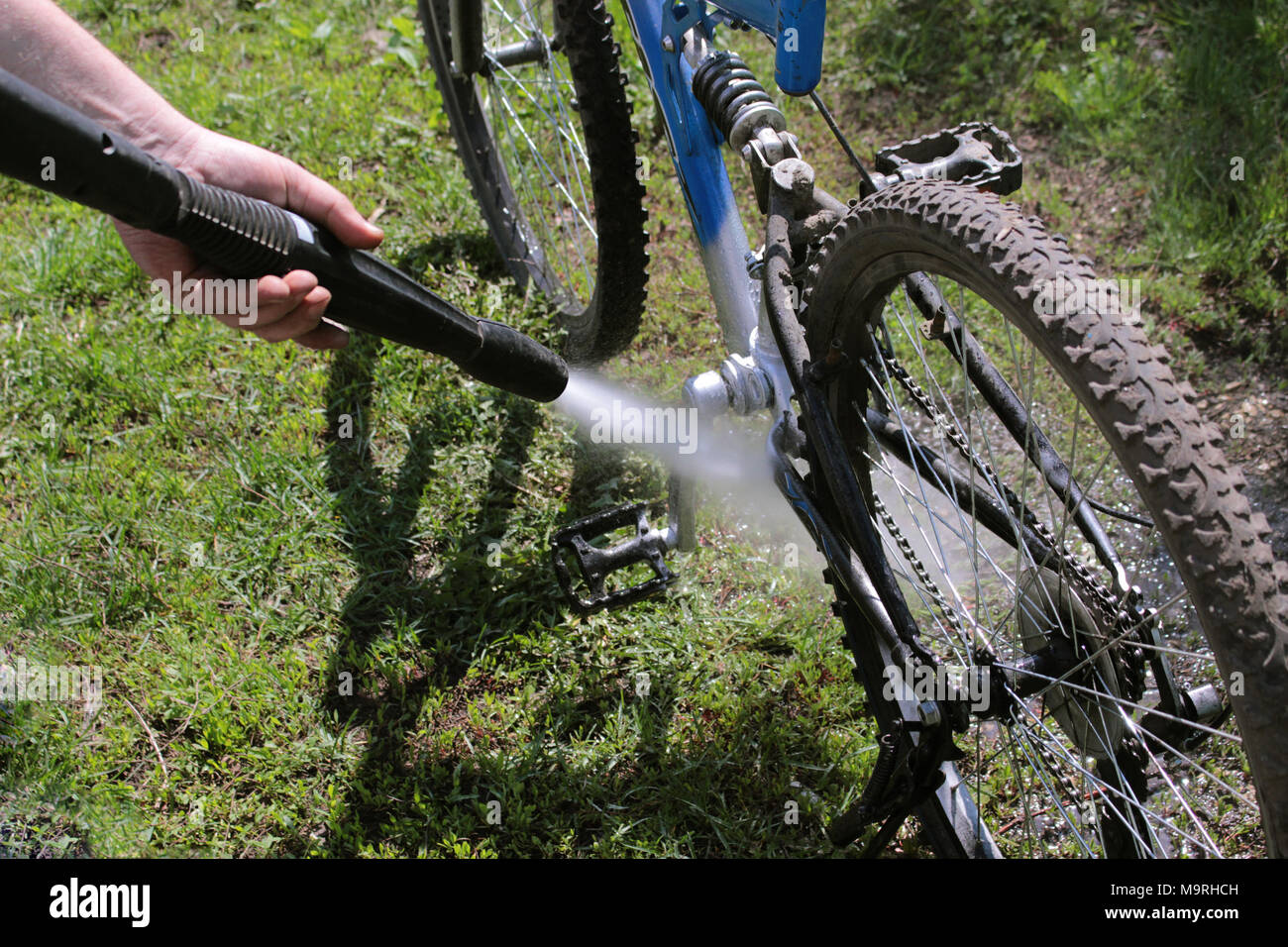 bicycle washing outdoors Stock Photo - Alamy