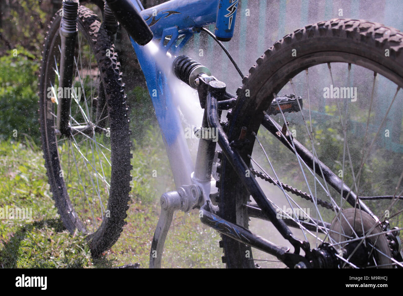 bicycle washing outdoors Stock Photo - Alamy