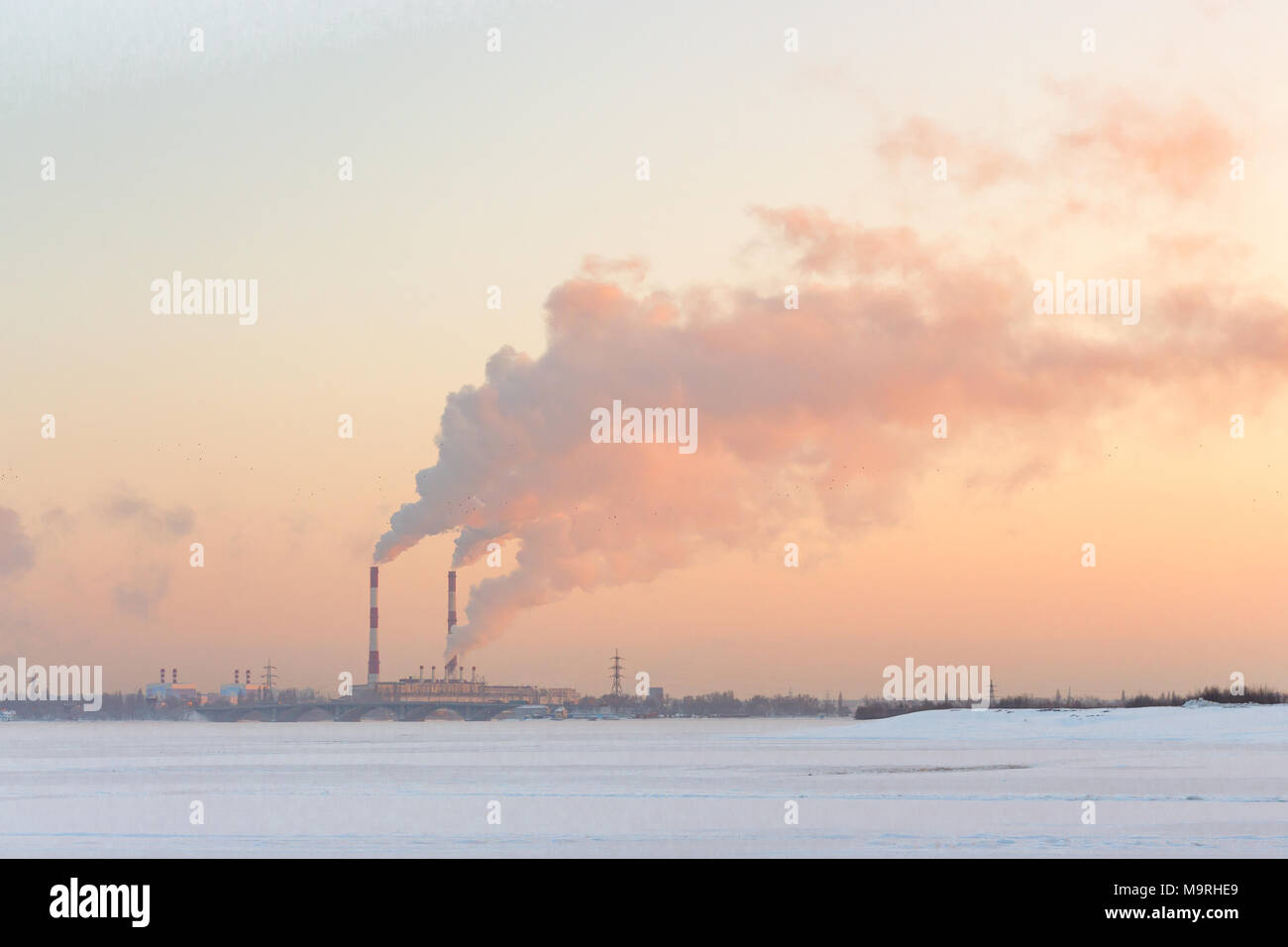 working factory distant view, winter evening Stock Photo - Alamy