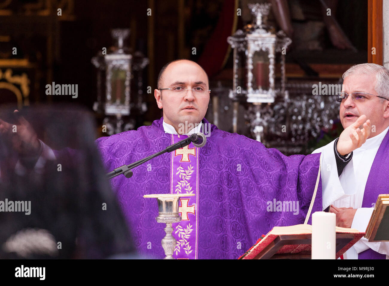 Priest celebrating mass outside the ermita de La Viña in Adeje old town ...