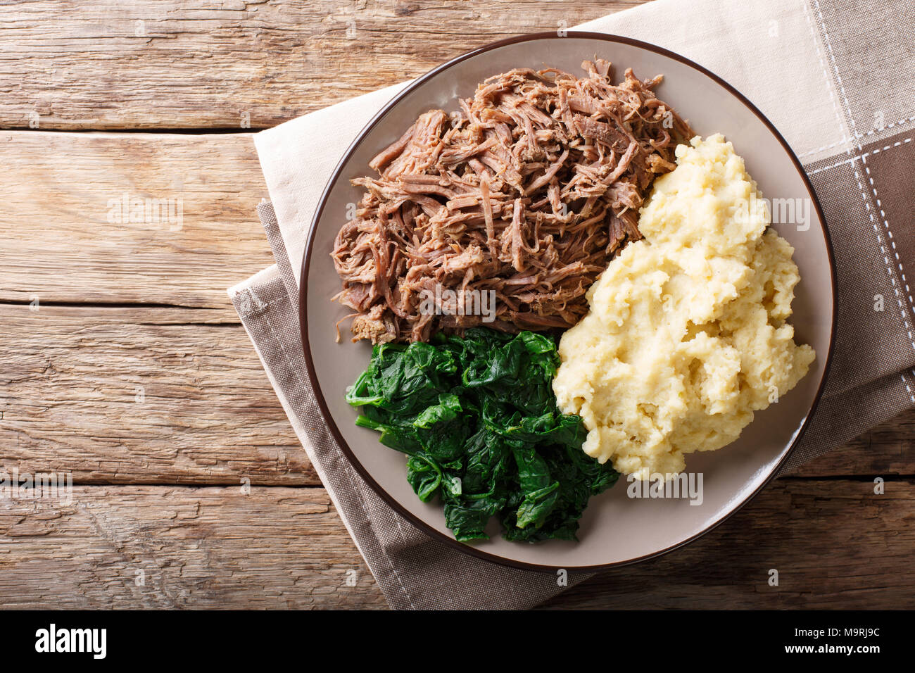 Botswana cuisine: seswaa beef stew with pap porridge and spinach close ...