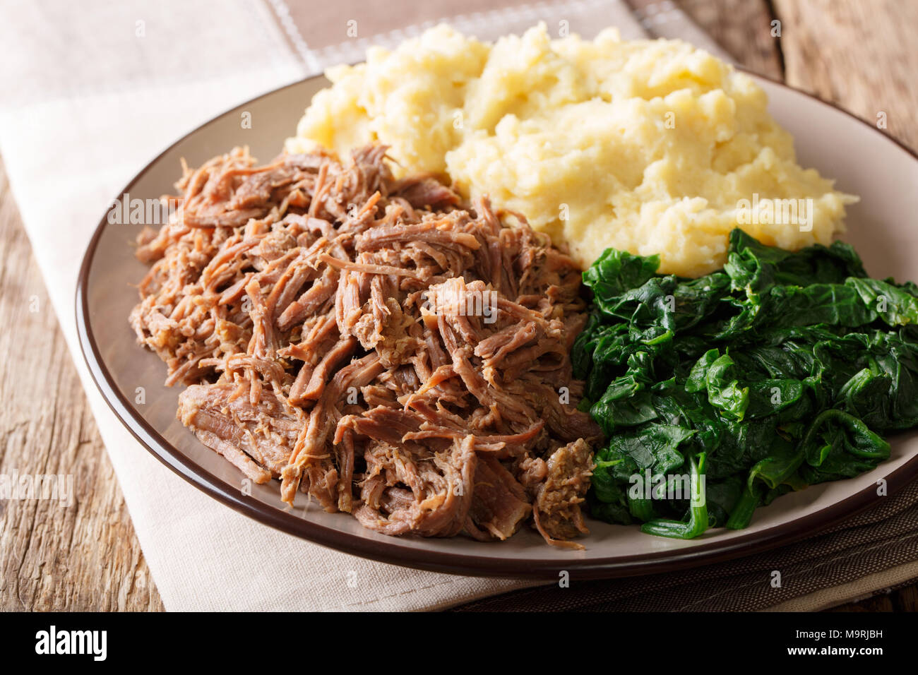 Botswana cuisine: seswaa beef stew with pap porridge and spinach close ...