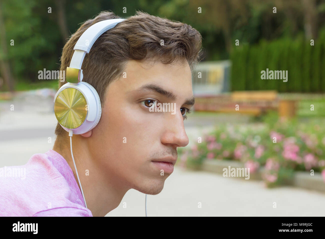 Handsome men in headphones listening hi-res stock photography and ...