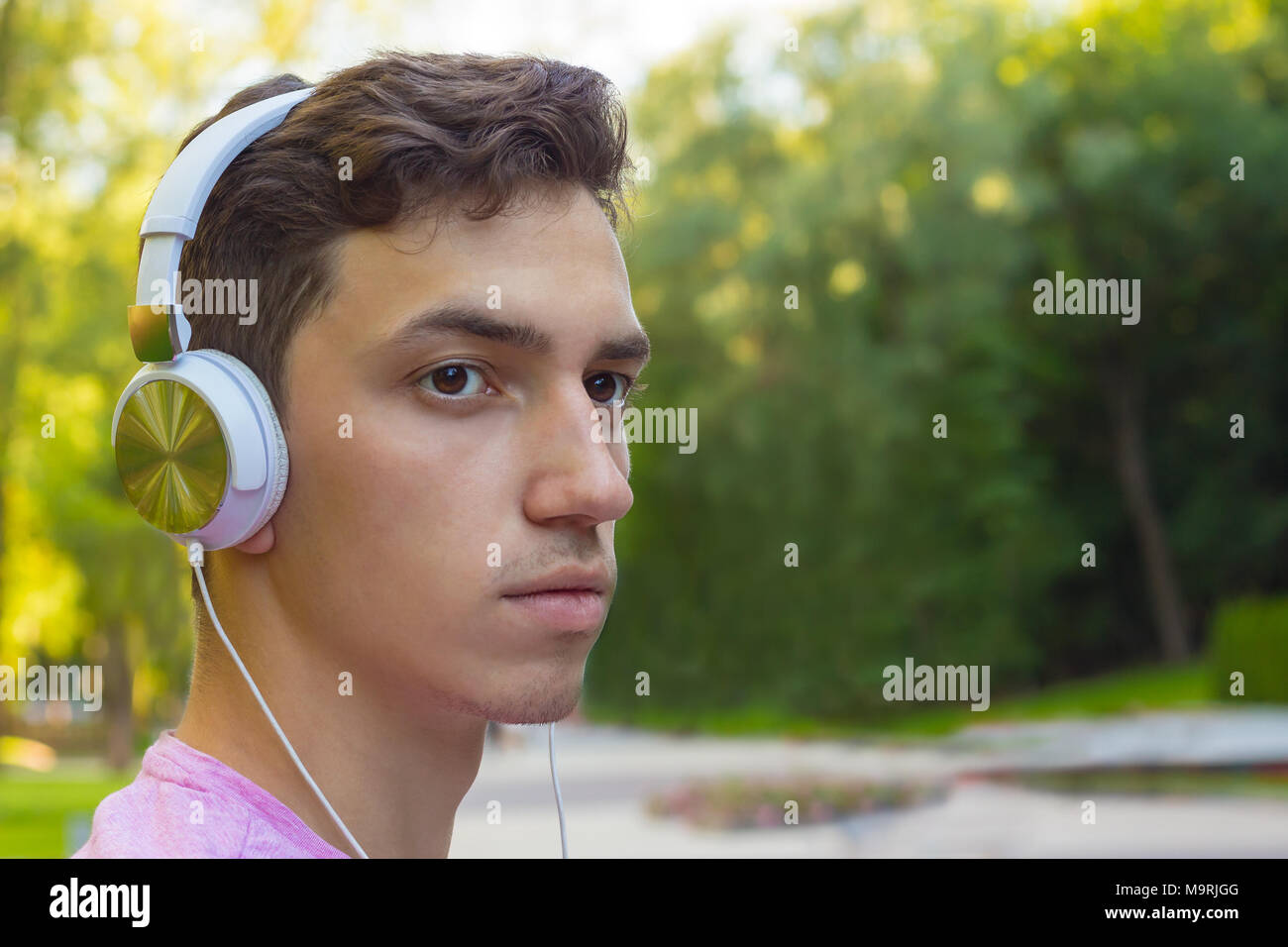 Handsome men in headphones listening hi-res stock photography and ...