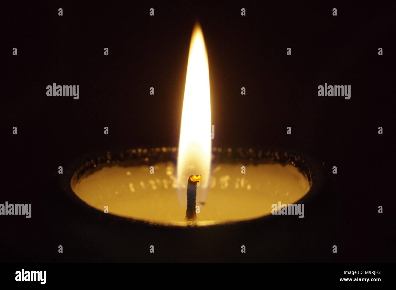 Candle light in the dark Stock Photo - Alamy