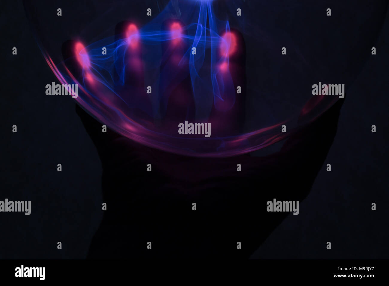Plasma ball hand hi-res stock photography and images - Alamy