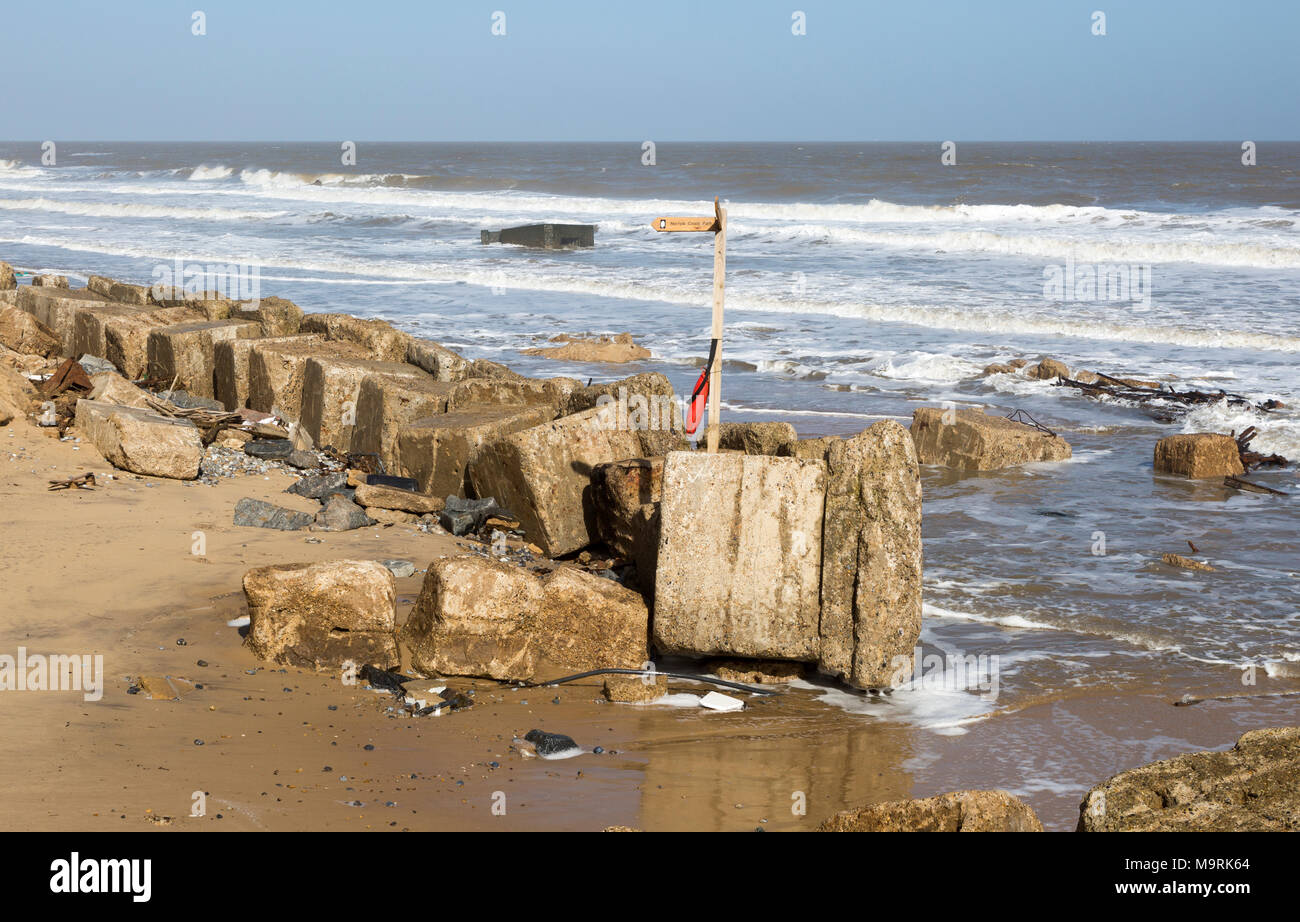 March 20 2018 Hemsby, UK. Coast path sign left abandoned by coastal ...