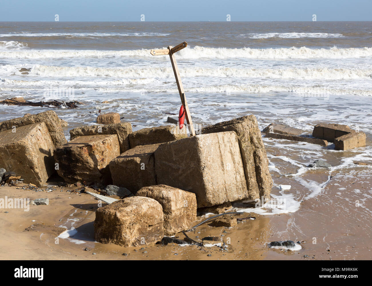 March 20 2018 Hemsby, UK. Coast path sign left abandoned by coastal ...