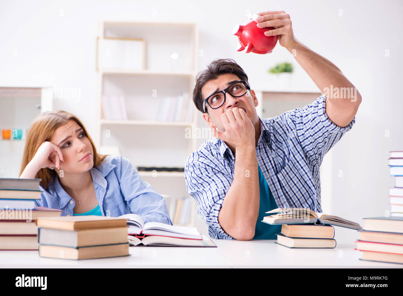 Checking out books library hi-res stock photography and images - Alamy