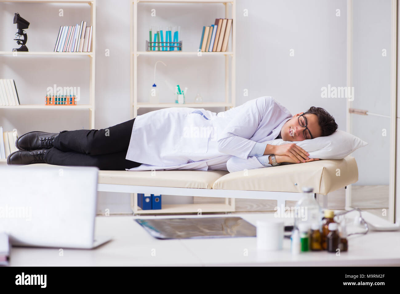 Doctor relaxing after complex surgery in hospital Stock Photo - Alamy