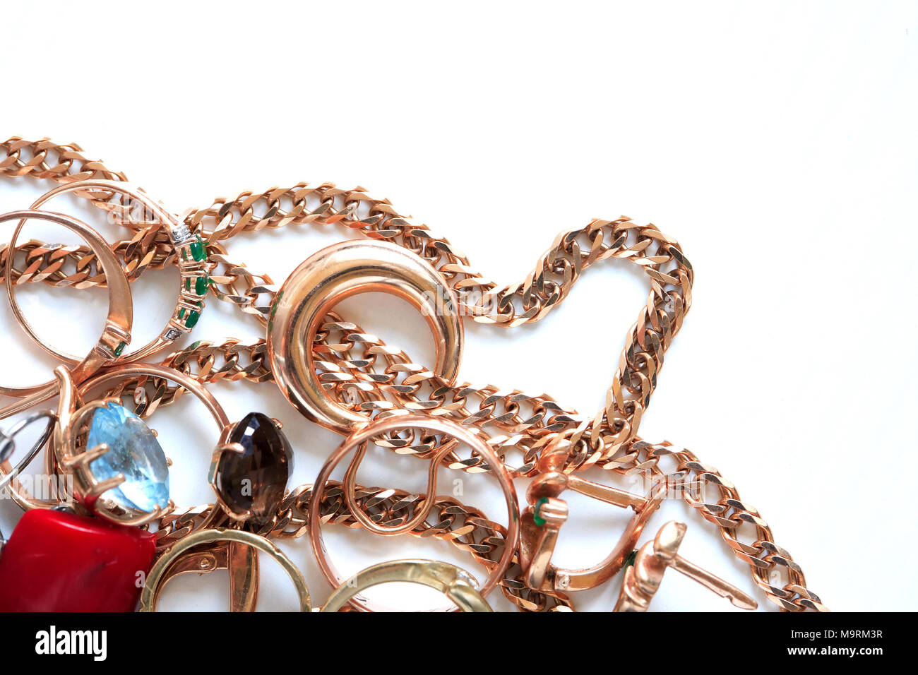 Set of various jewelry adornments on white background with free space ...