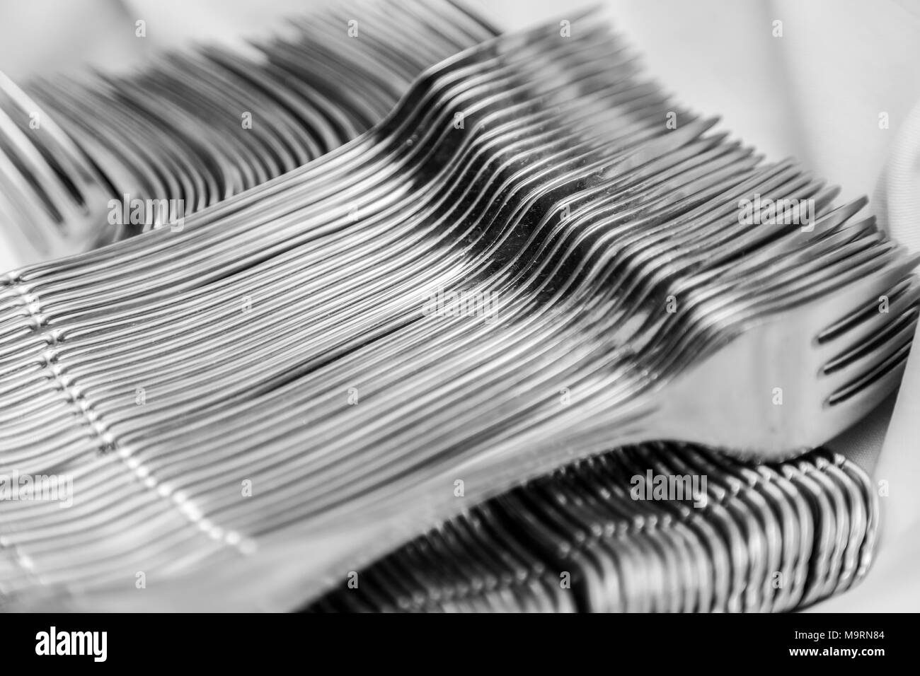 Many forks Black and White Stock Photos & Images - Alamy