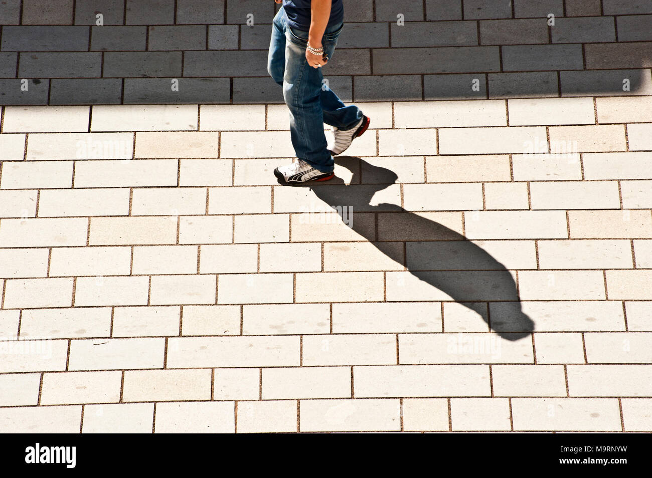 One person shadow hi-res stock photography and images - Alamy