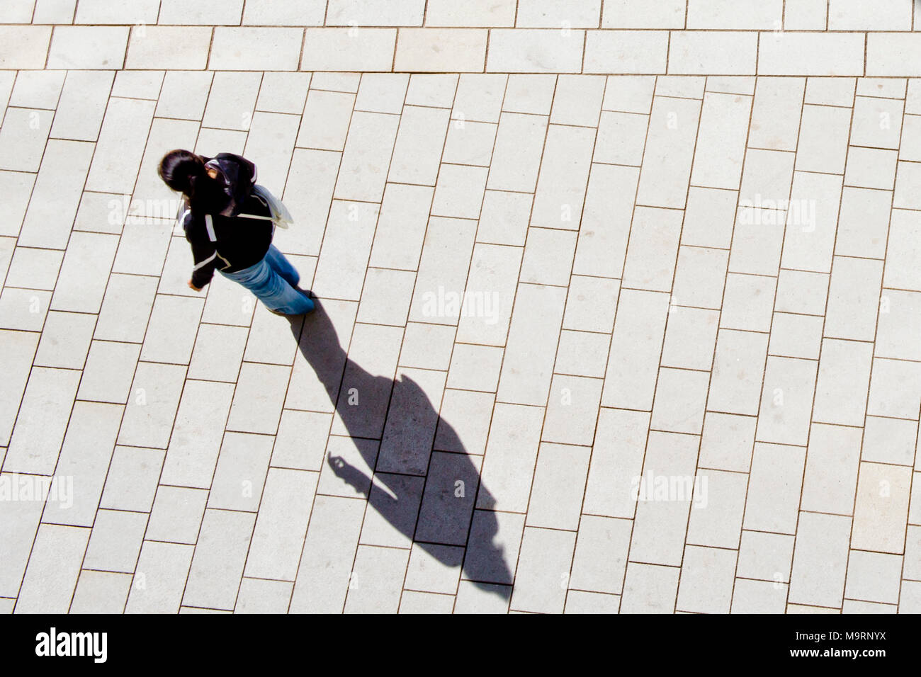 Person shadow walking hi-res stock photography and images - Alamy
