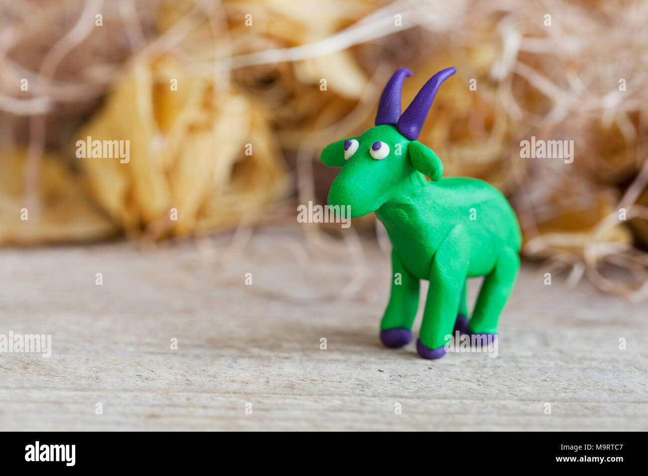 Plasticine world - little homemade green goat with purple horns and ...