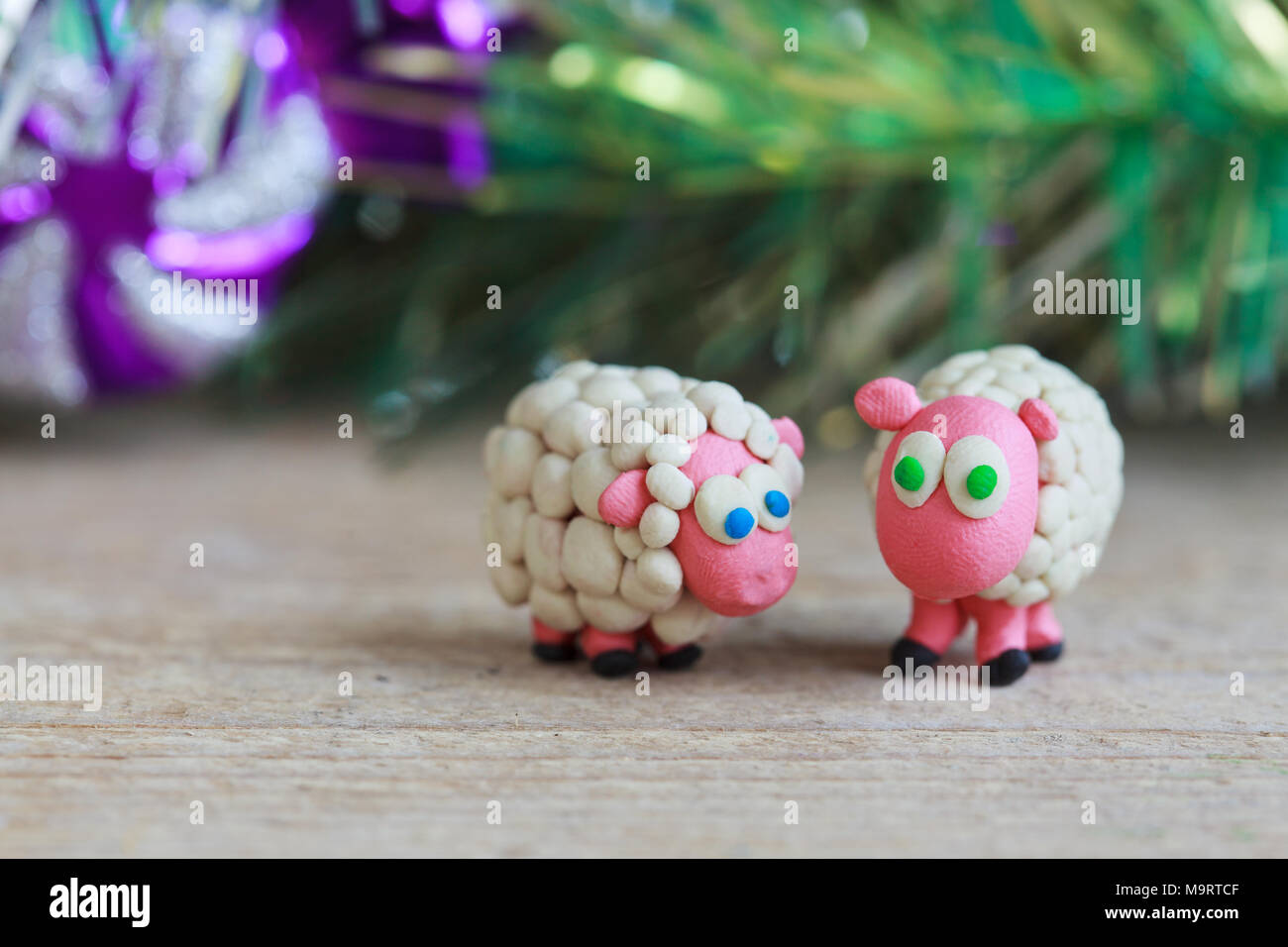 Plasticine world - little homemade white sheep with blue and green eyes ...