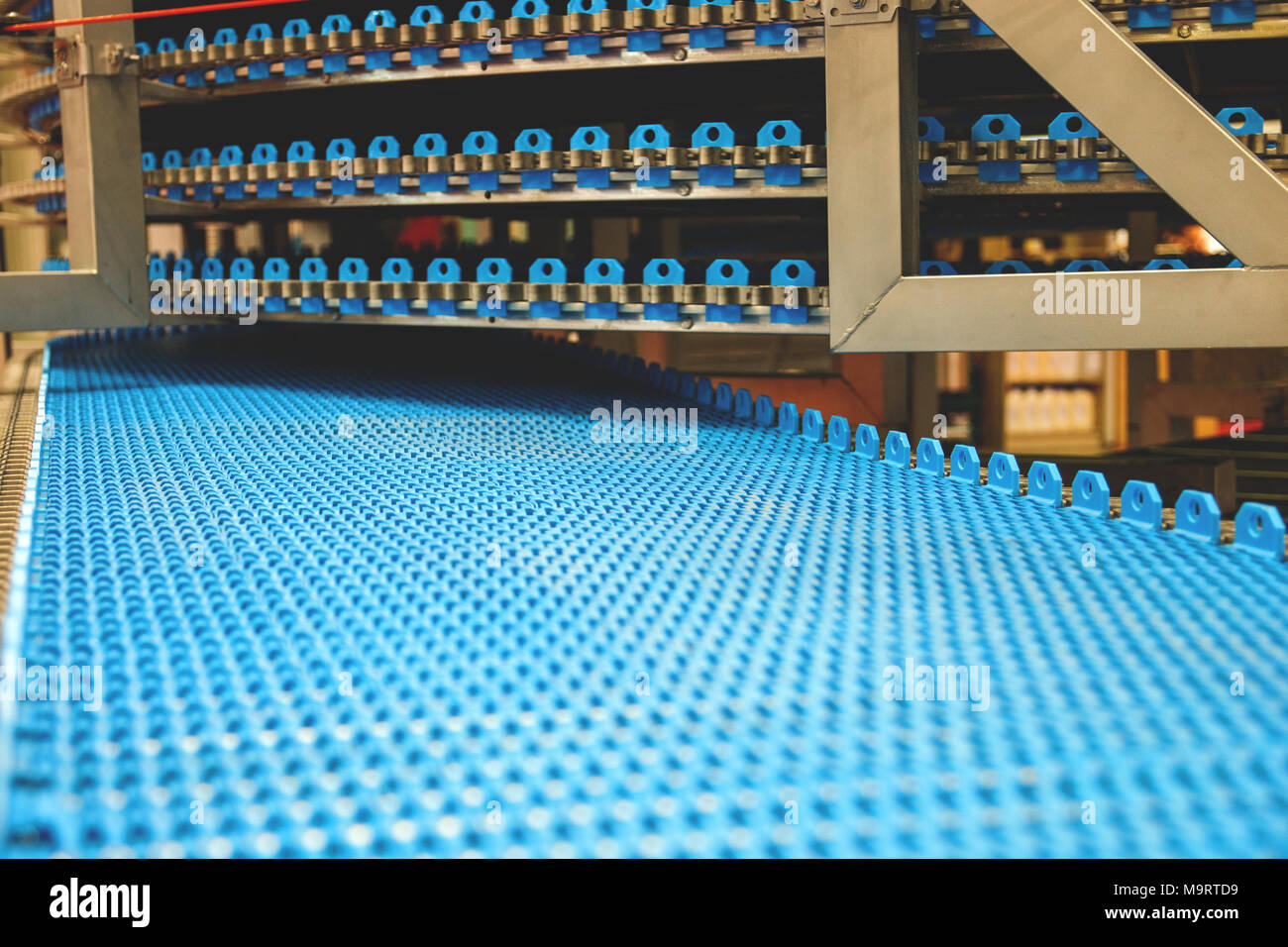 Empty conveyor belt for bread factory Stock Photo - Alamy