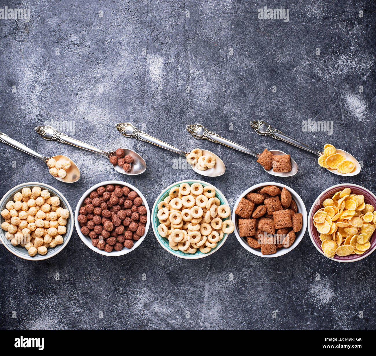 Selection of various corn flakes for breakfast. Top view Stock Photo ...