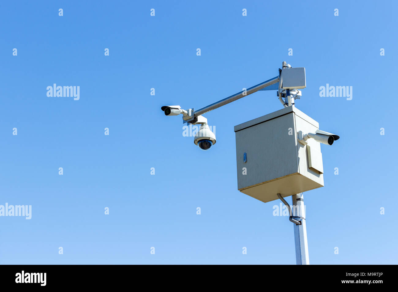 three cameras Cctv technology, video photography on the sky background ...