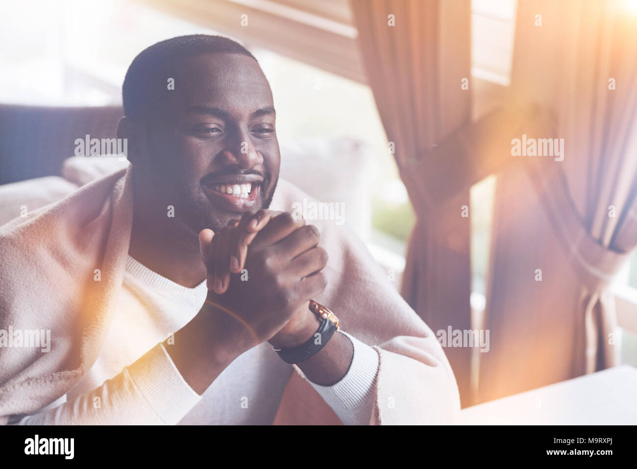 Portrait of delighted male person looking forward Stock Photo - Alamy