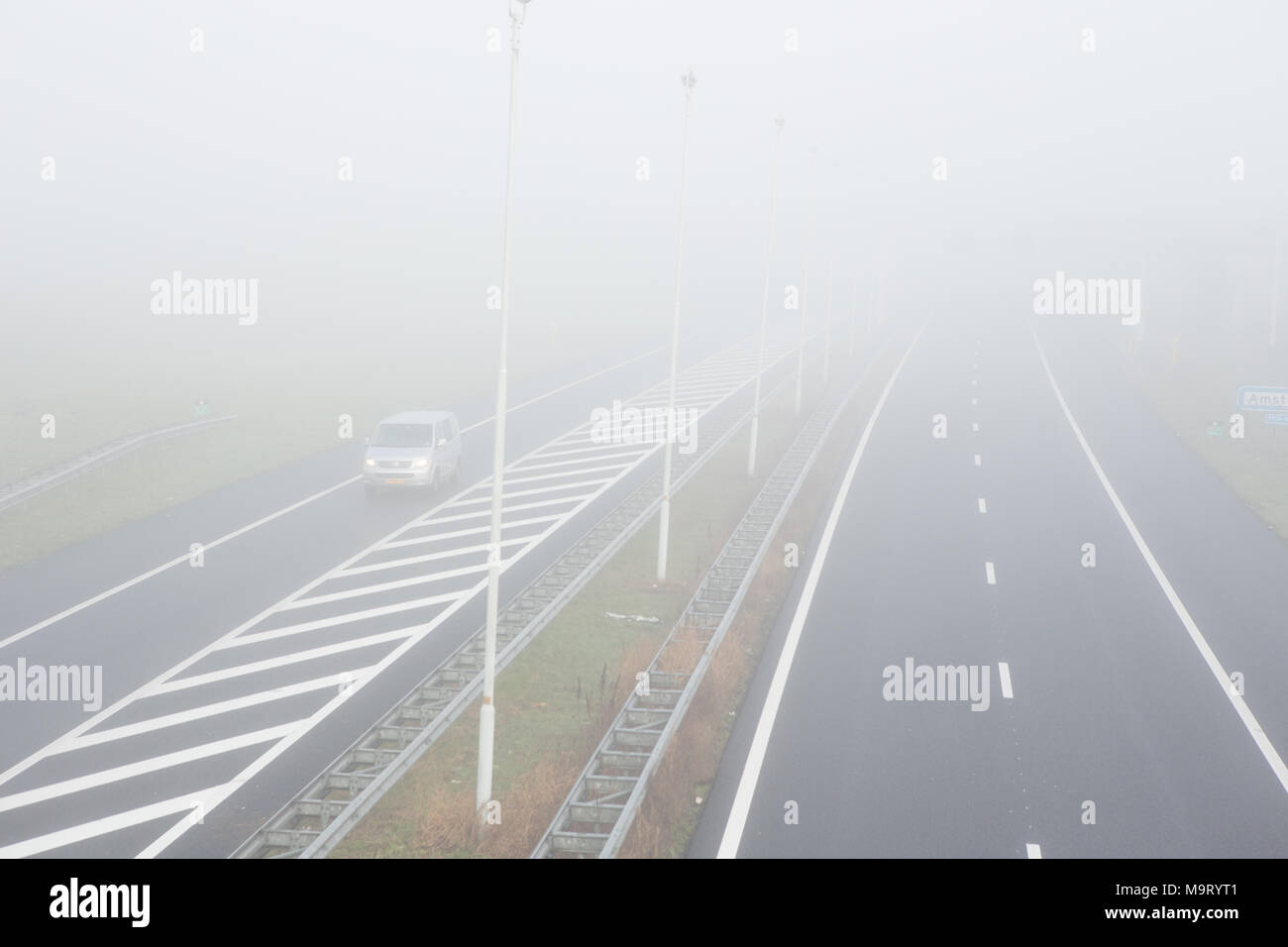 Fog on the A2 motorway in Amsterdam Stock Photo - Alamy