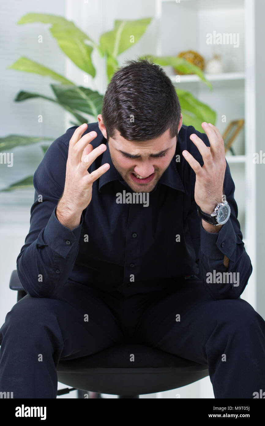 nervous businessman yelling, worried about job Stock Photo - Alamy