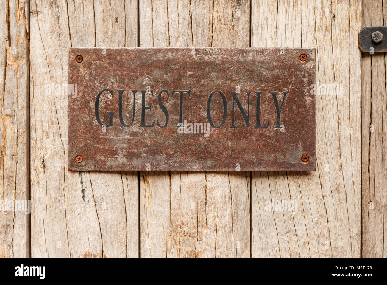 Label of guest only on wood Stock Photo - Alamy